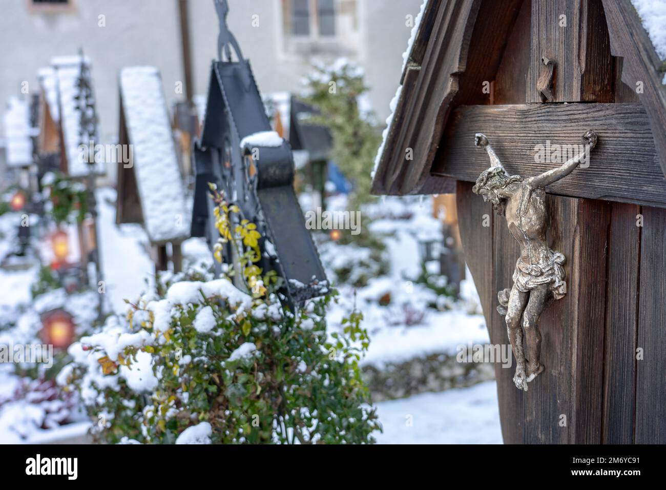 cemetery christmas time jesus on cross and tombstones with candle ...