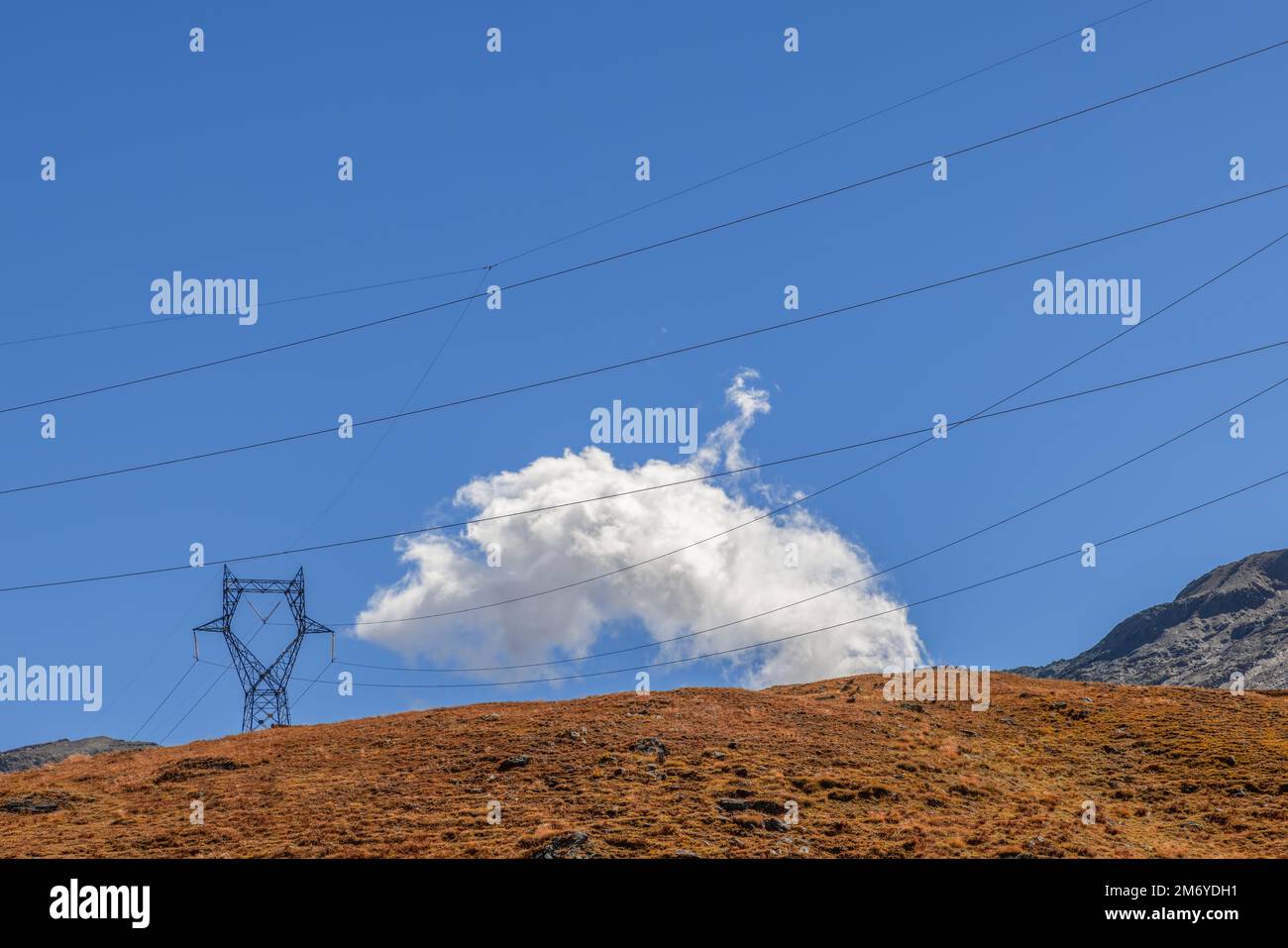 Diverging wires of high-voltage power line with masts installed on ...