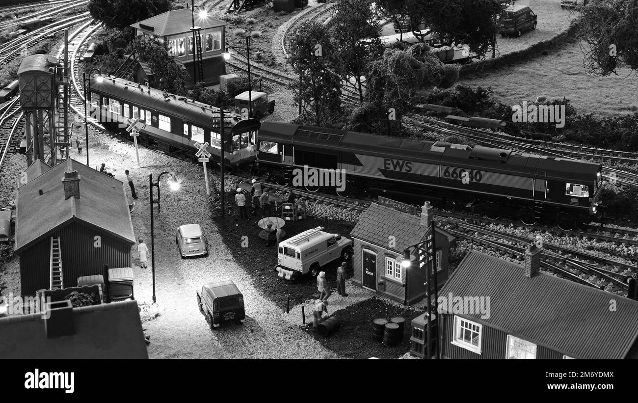 A class 66 and an Inspection saloon in EWS branding Stock Photo - Alamy
