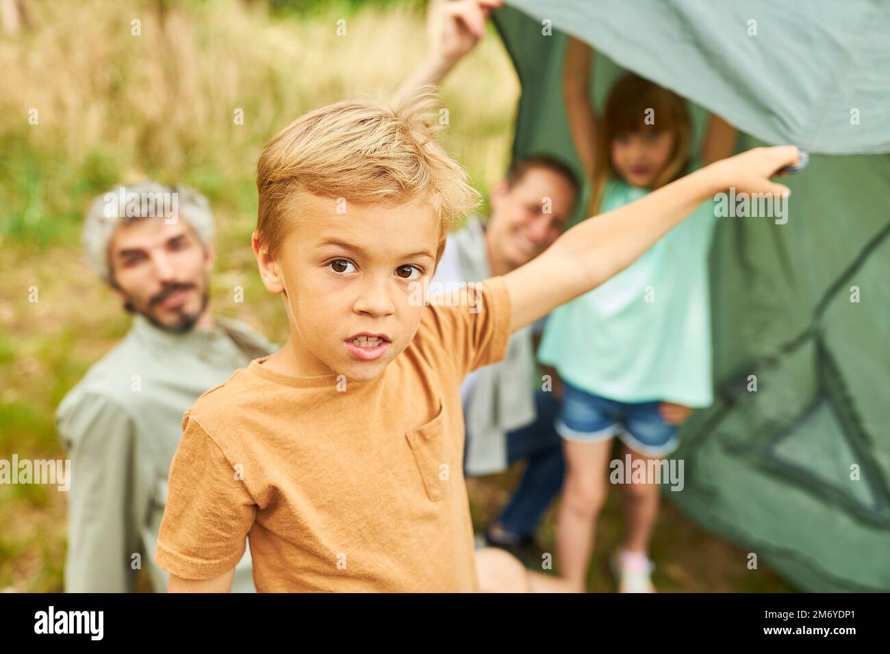 Boy setting hi-res stock photography and images - Alamy