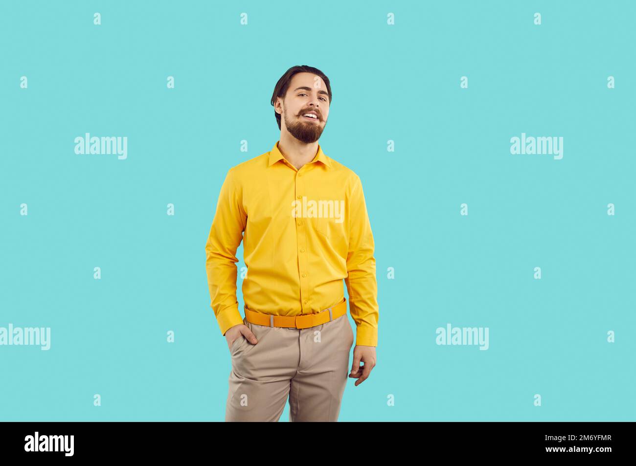 Studio portrait of smiling confident stylish millennial man isolated on ...