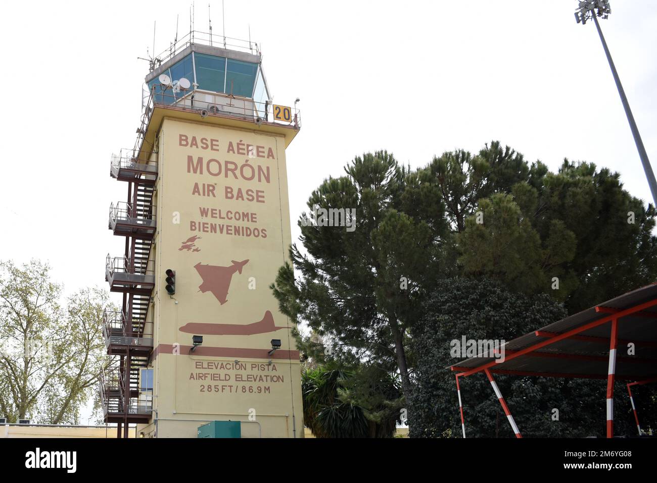 U.S. air traffic controllers stationed at Morón Air Base, Spain, sit ...
