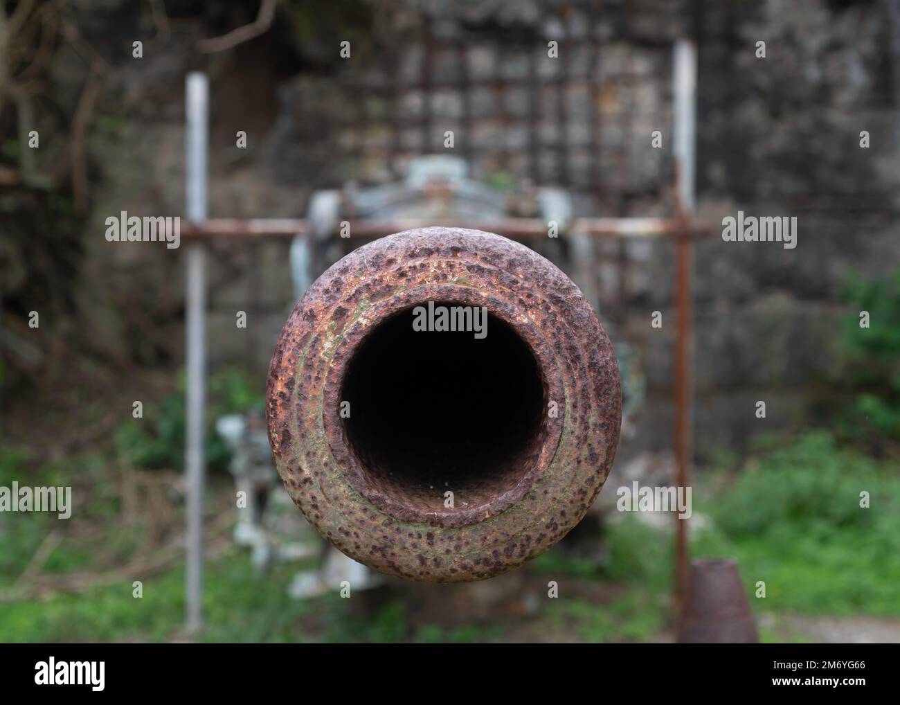 A Naval horizontal submarine cannon points at Invasion Beach, Iwo Jima ...