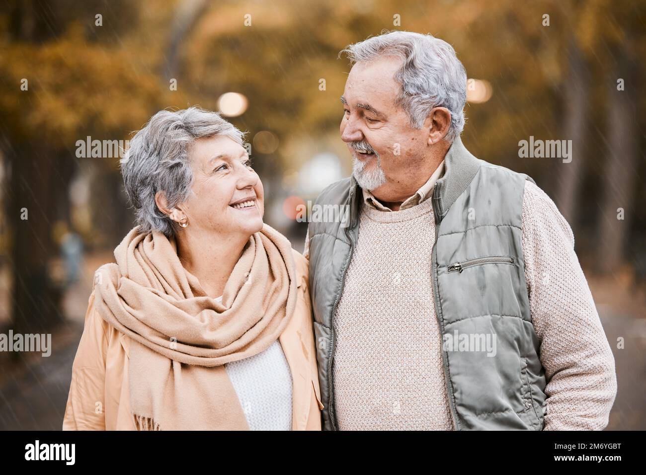 Senior couple, love and health while walking outdoor for exercise ...