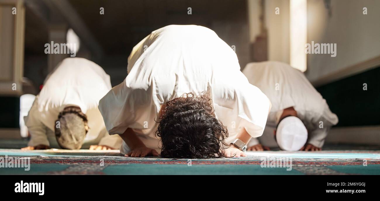 Muslim, prayer and mosque with a spiritual man group praying in faith ...
