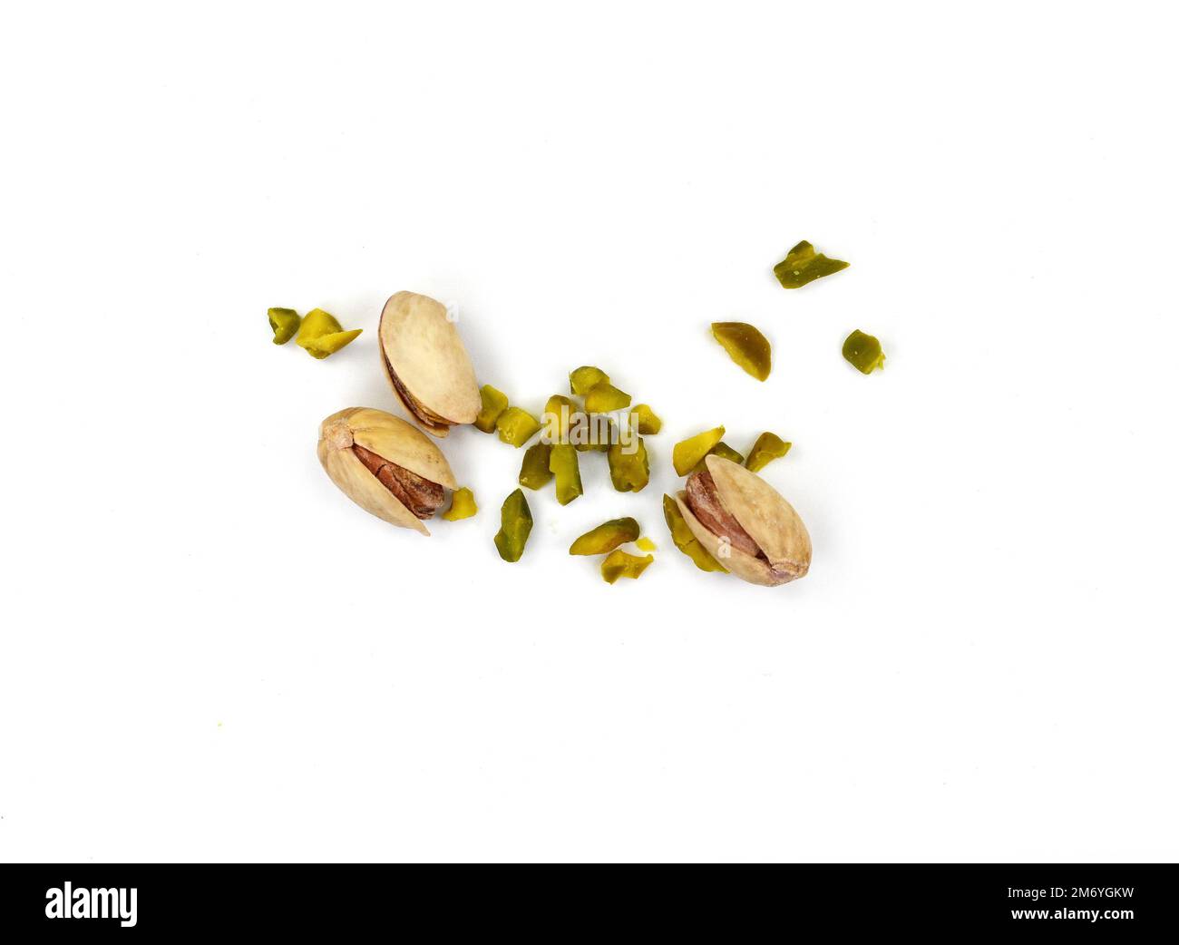 Ground, milled, crushed or granulated pistachio pile isolated on white ...