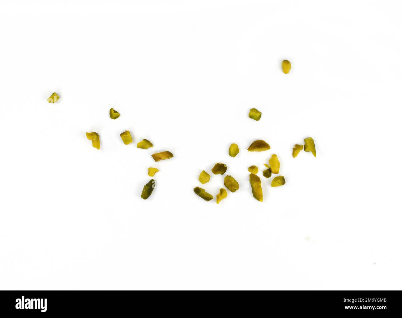 Ground, milled, crushed or granulated pistachio pile isolated on white ...