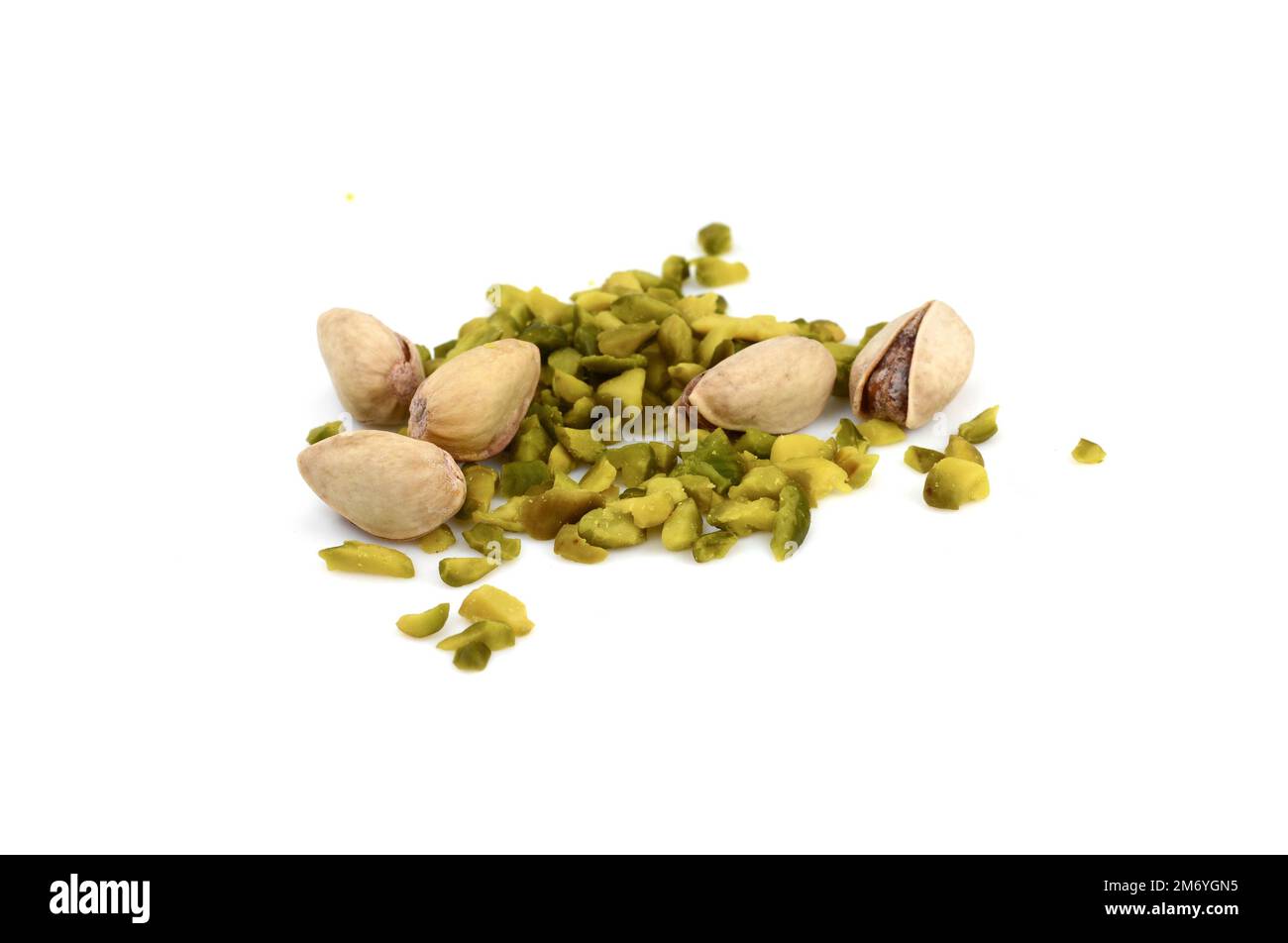 Ground, milled, crushed or granulated pistachio pile isolated on white ...