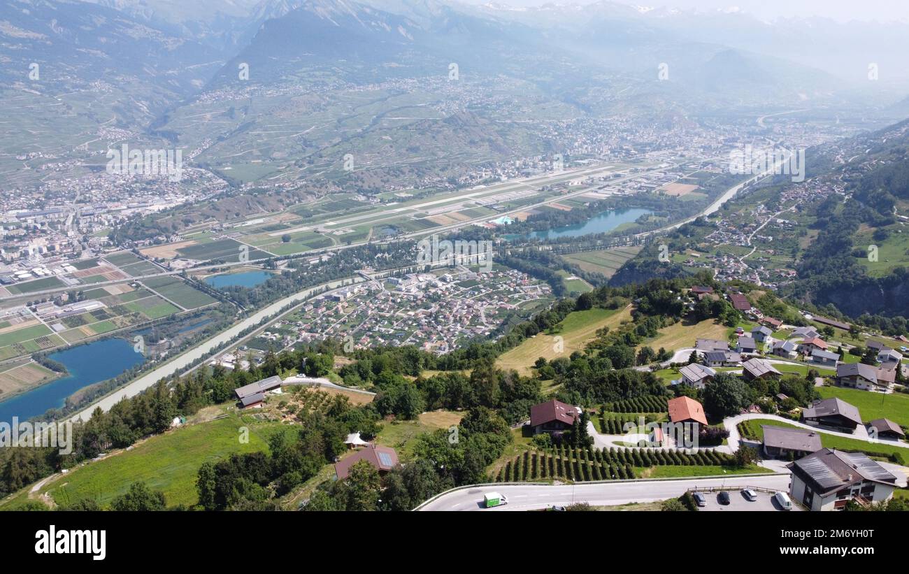 Swiss Alps in Sion area, aerial footage taken by a drone during warm ...