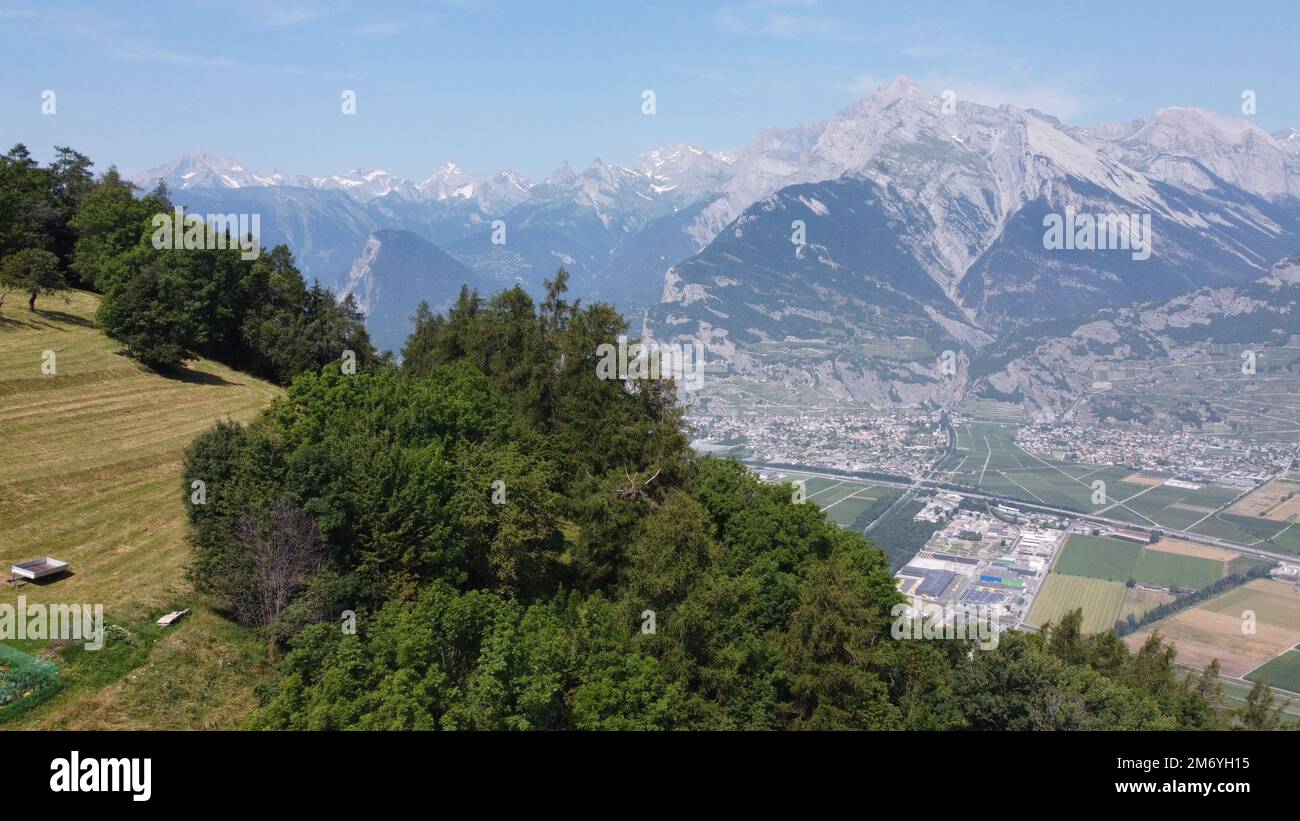 Swiss Alps in Sion area, aerial footage taken by a drone during warm ...