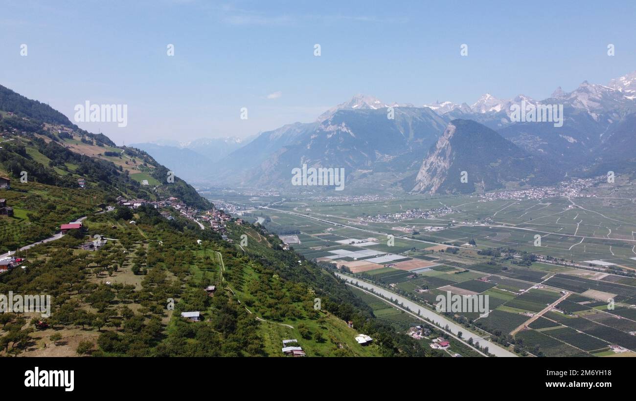Swiss Alps in Sion area, aerial footage taken by a drone during warm ...