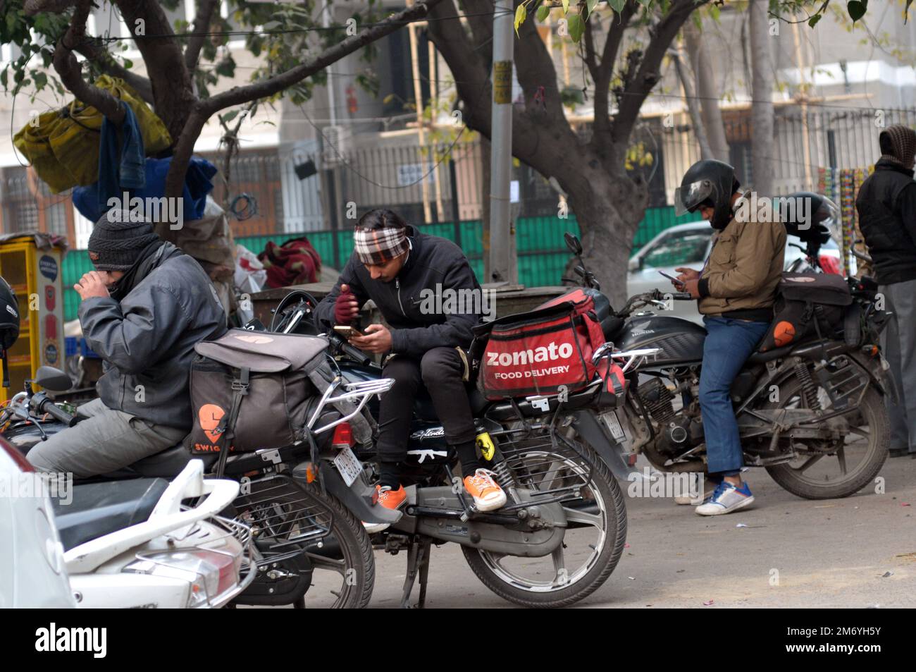 New Delhi, Delhi, India. 6th Jan, 2023. Zomato vendors busy on mobile ...