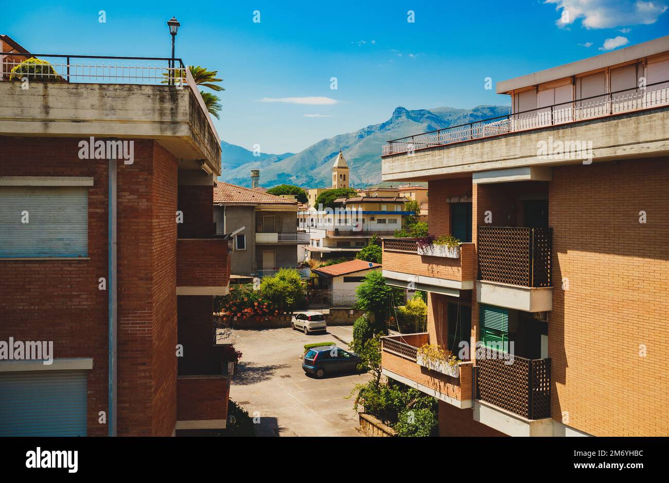 Apartment buildings and church in Scauri, Italy Stock Photo - Alamy