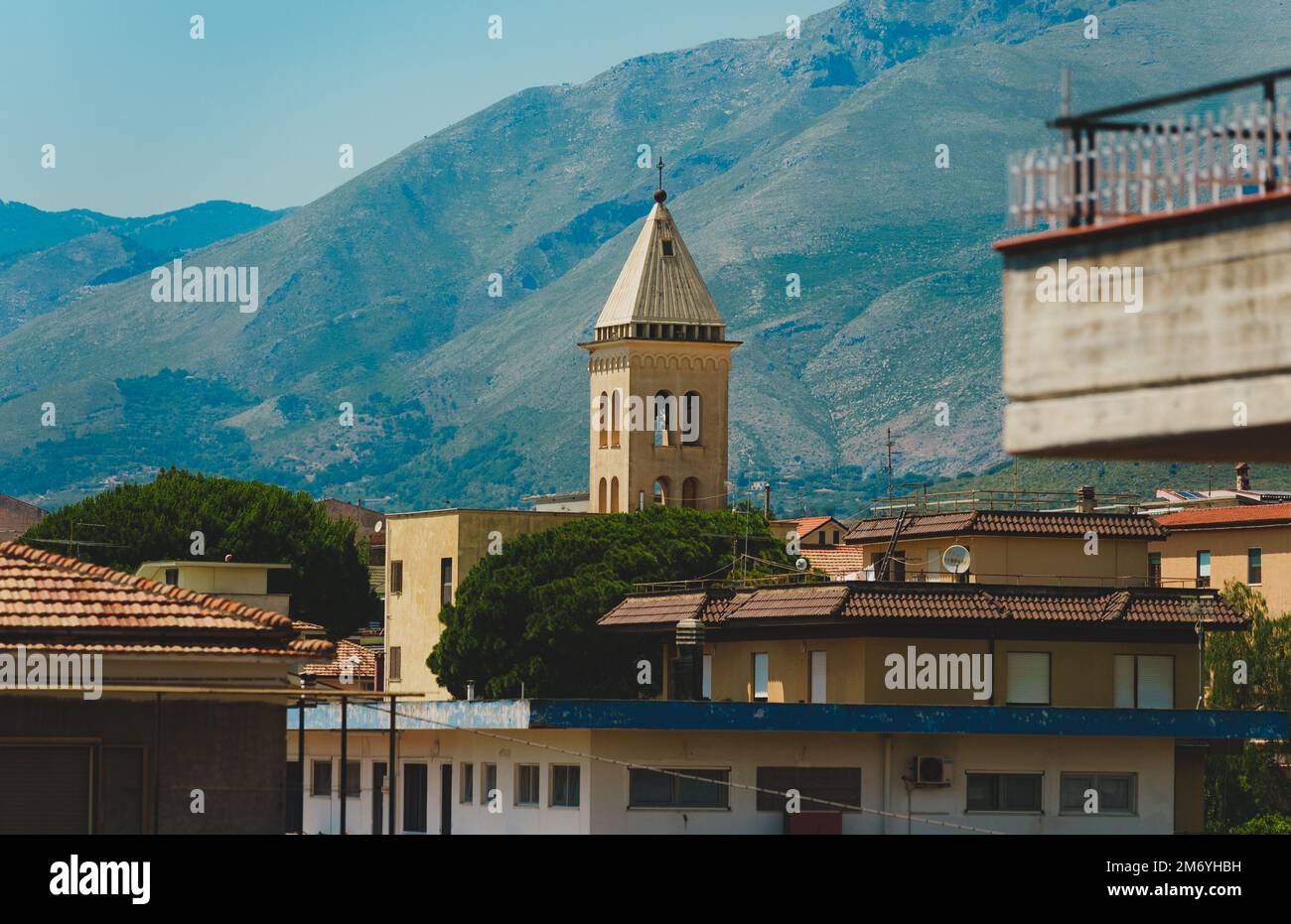 Apartment buildings and church in Scauri, Italy Stock Photo - Alamy