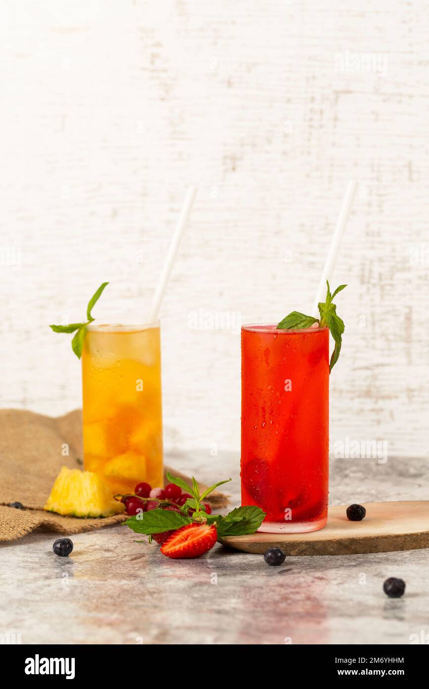 fruit flavored drinks served in glasses Stock Photo - Alamy