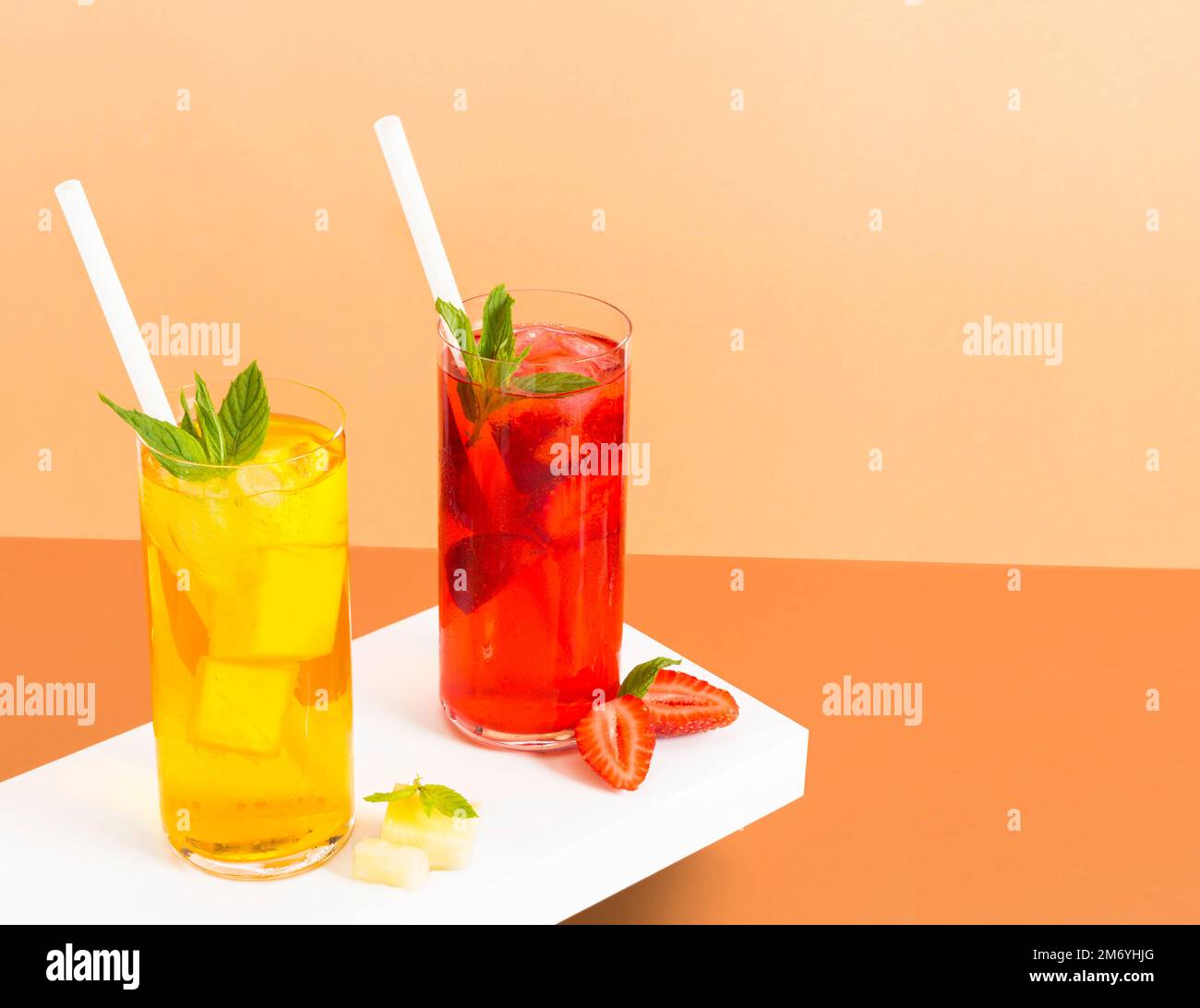 fruit flavored drinks served in glasses Stock Photo - Alamy