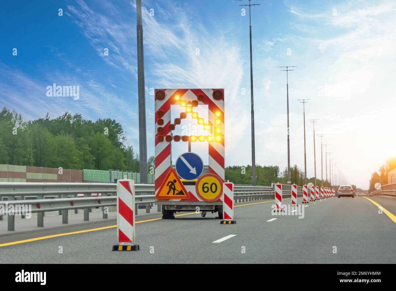 Road services vehicle with trailer and speed limit and lane maintenance ...