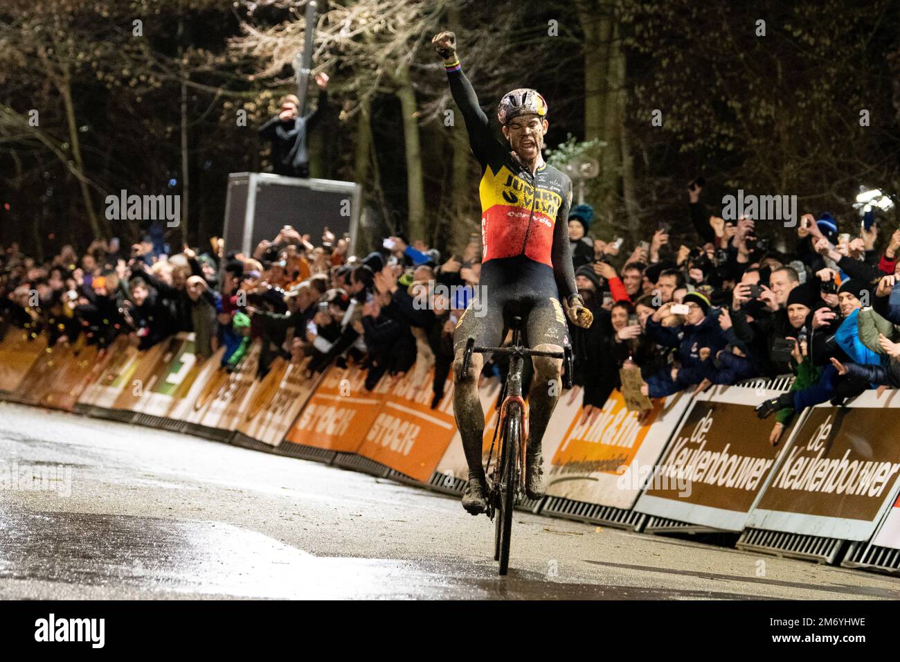 Wout van Aert celebrates on the finish line as she wins the ...