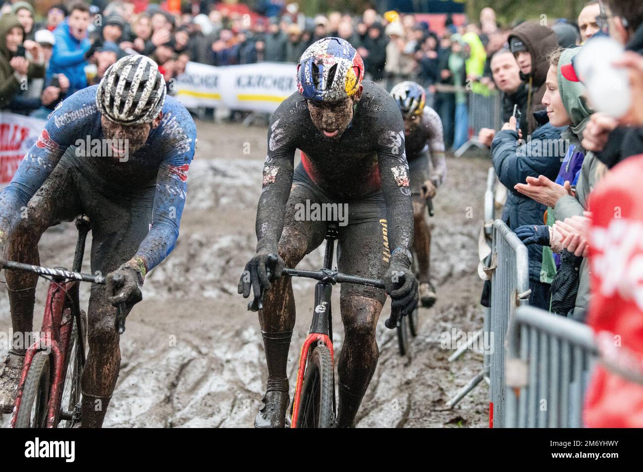 Mathieu van der Poel and Wout van Aert ride through the mud in the ...