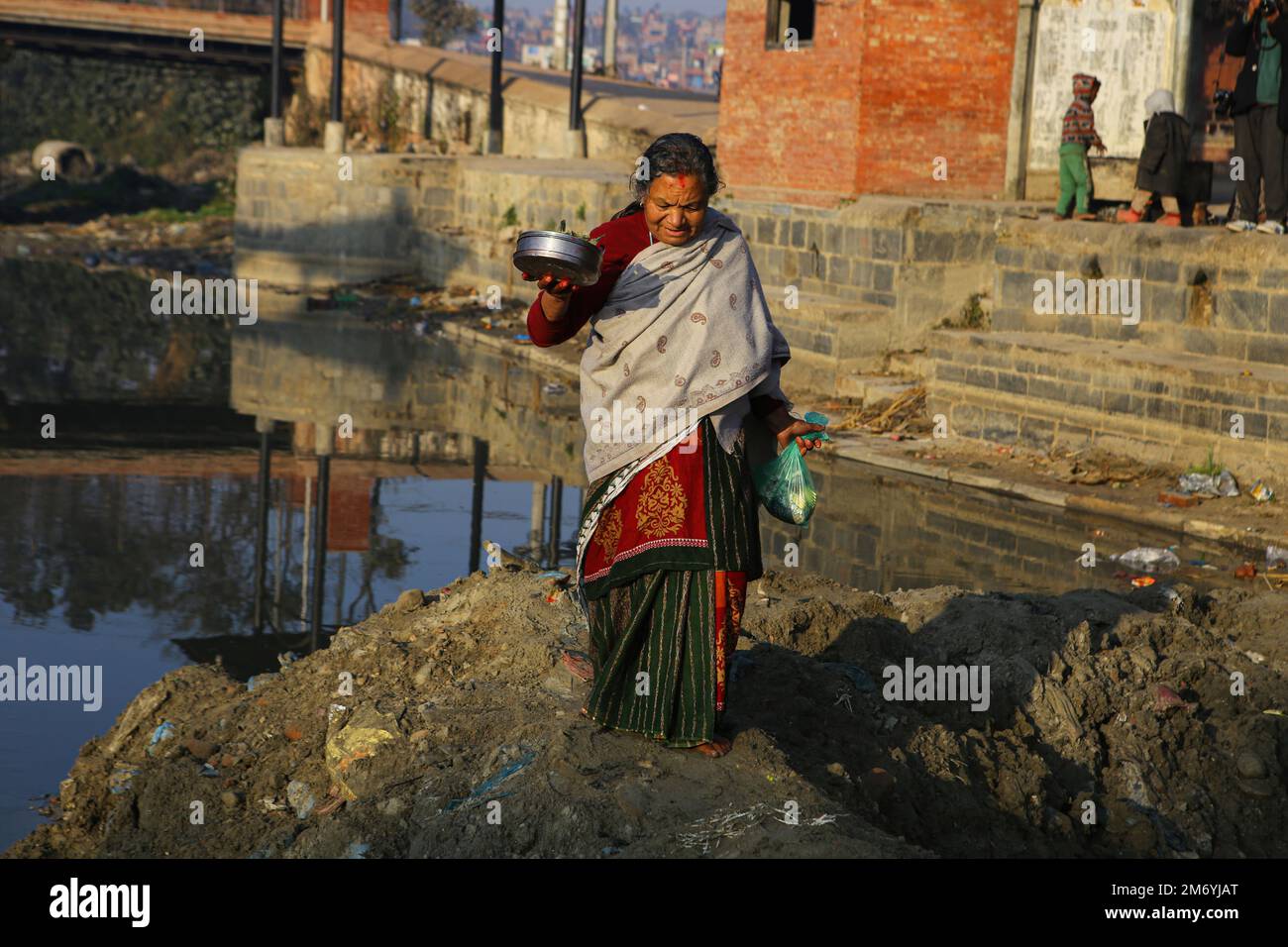 Bhaktapur, Nepal. 06th Jan, 2023. A Hindu devotee performs rituals at ...