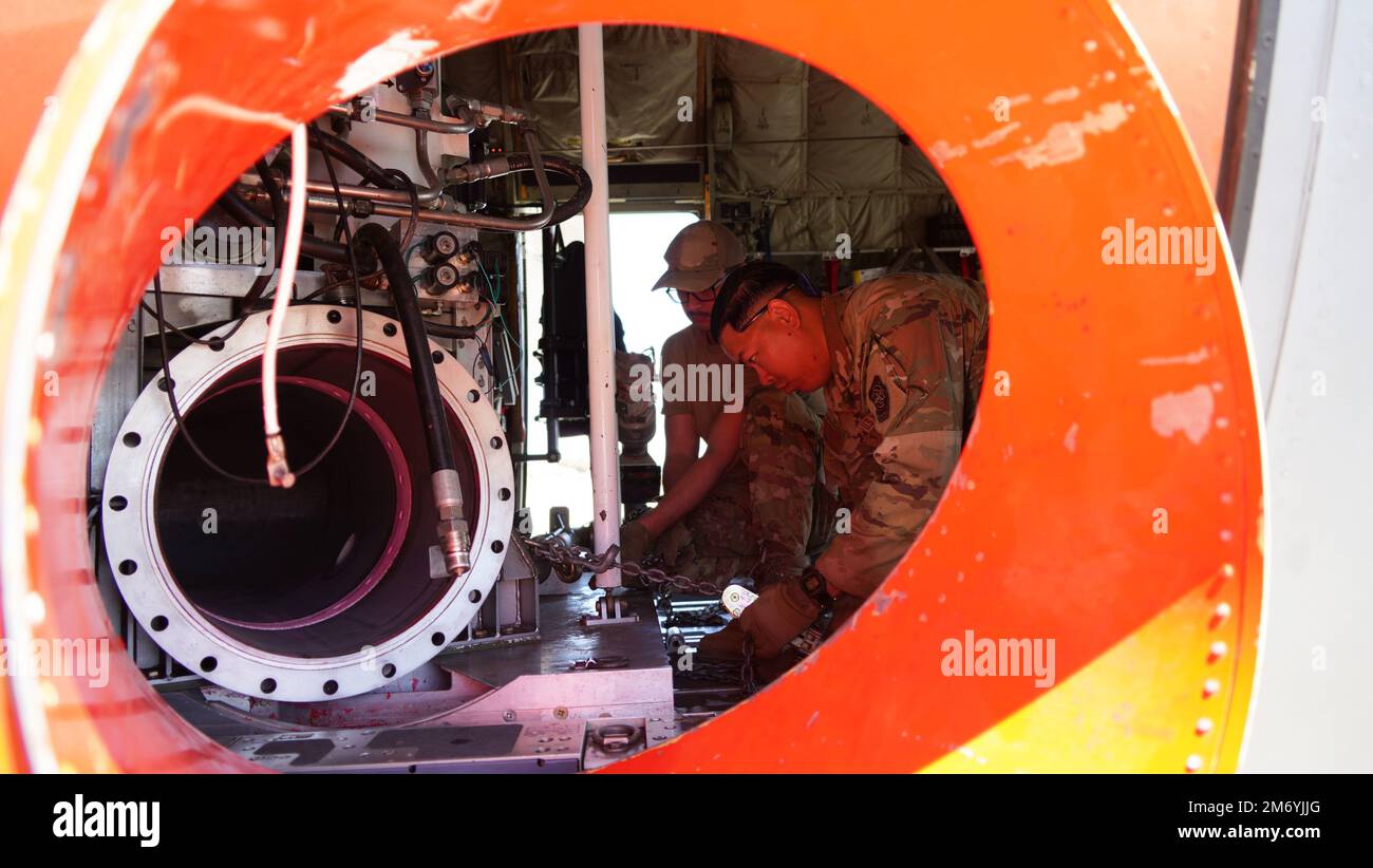 U.S. Air Force personnel assigned to the 146th Airlift Wing secure the ...