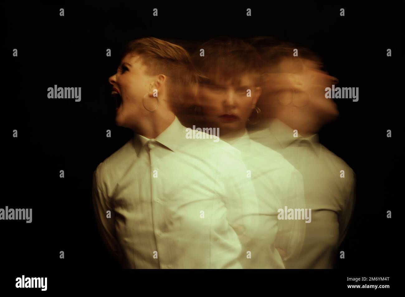 crazy psychopathic girl with mental disorders in a straitjacket on a ...