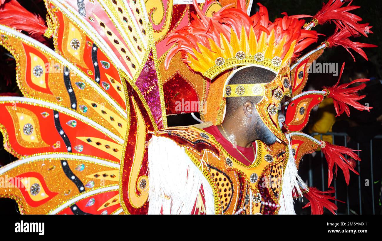 A man in a traditional costume during a Junkanoo parade in the Bahamas ...