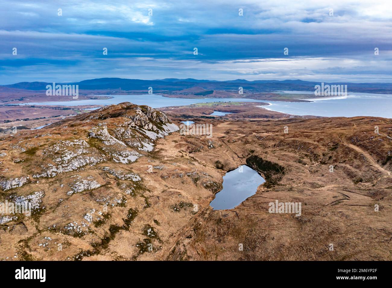 Aerial view of the lake next to Agnish Lough by Maghery, Dungloe ...
