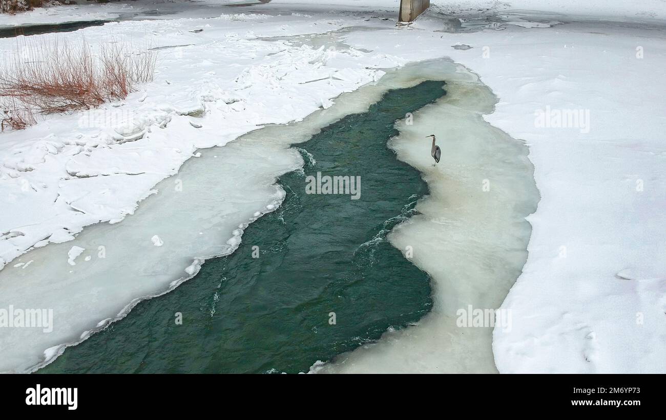 An aerial view of the frozen Clark fork Confluence river and landscape ...