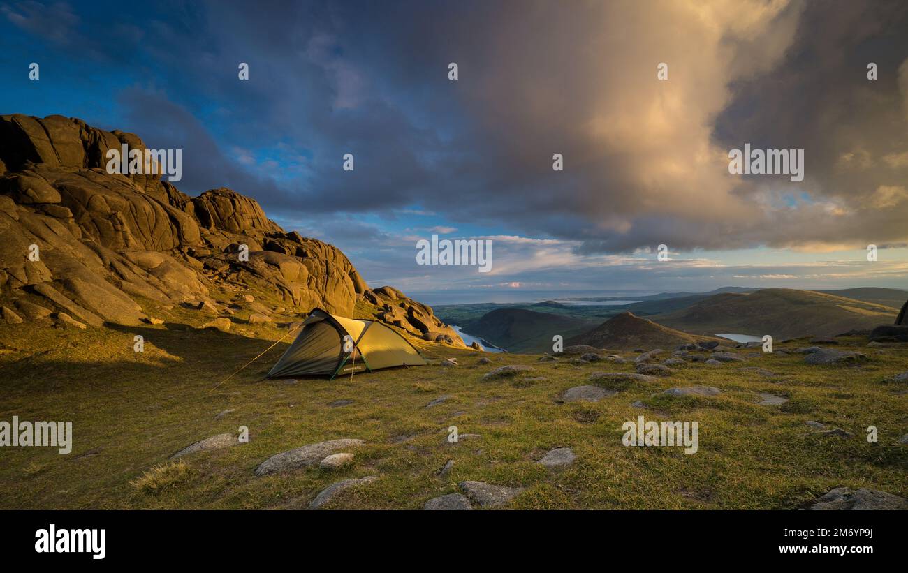 Slieve Bearnagh summit camp in the Mourne mountains Stock Photo - Alamy