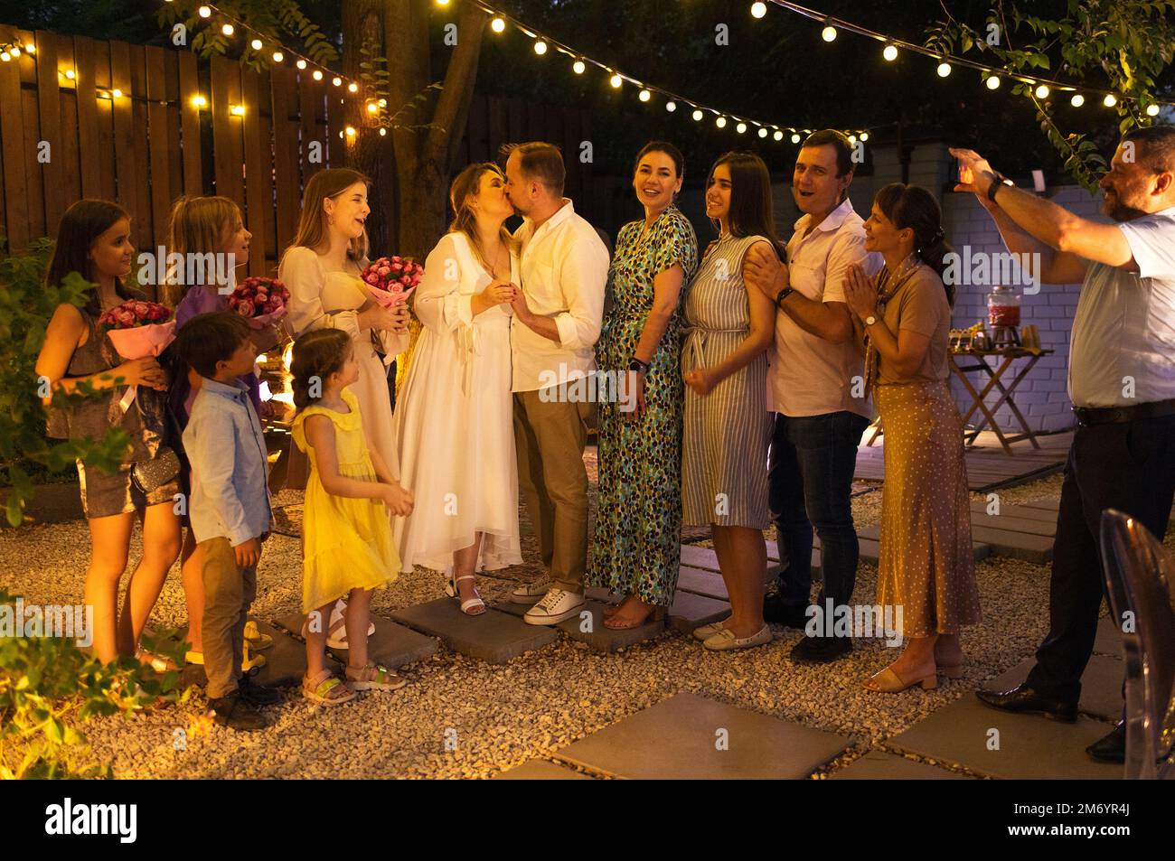 Open wedding ceremony. Bride, groom, best man, bridesmaids around ...