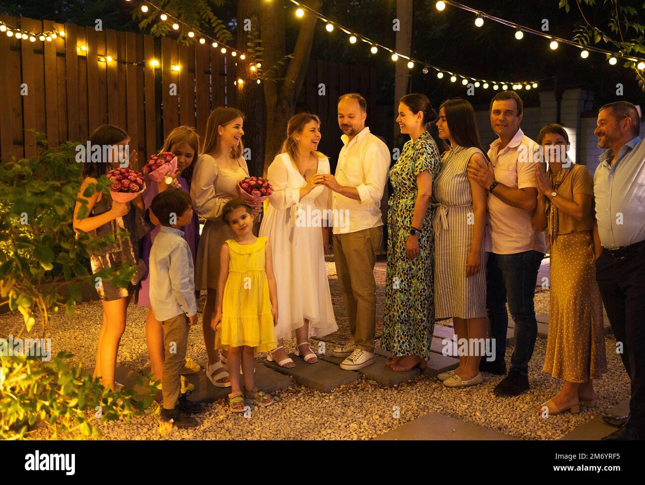 Open wedding ceremony. Bride, groom, best man, bridesmaids around ...