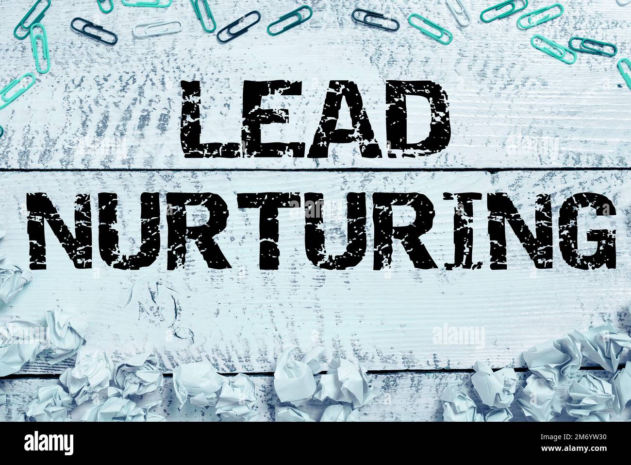 Hand writing sign Lead Nurturing. Word for method of building a ...