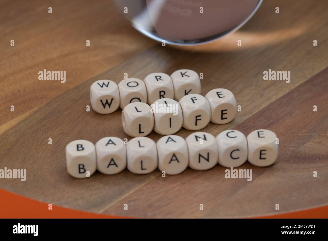Wooden letters with the words spelt out in work life balance, work ...