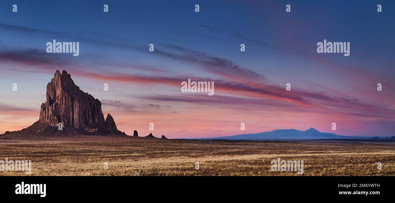 Shiprock, the great volcanic rock mountain in desert plane of New ...