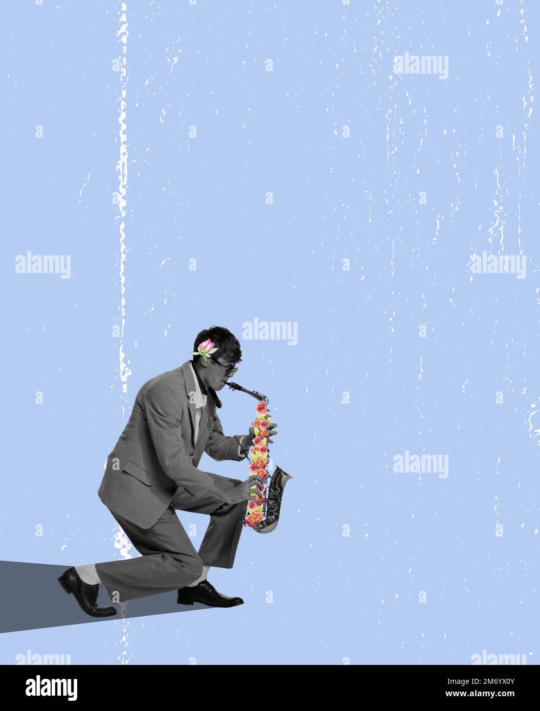 Floral melody. Emotional male musician playing saxophone with sticking ...