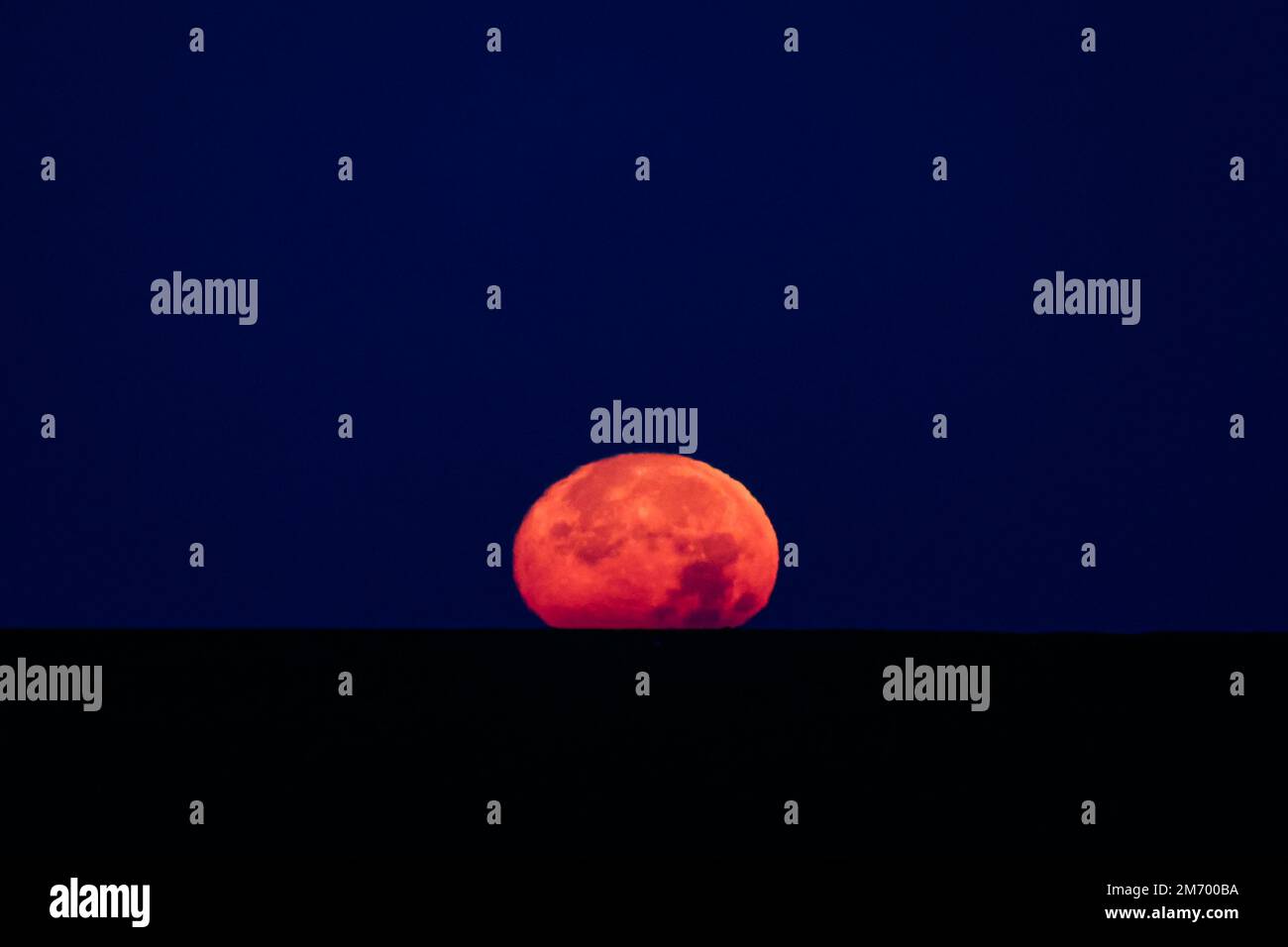 Hail, Saudi Arabia - January 6th, 2023. The moon setting during the ...