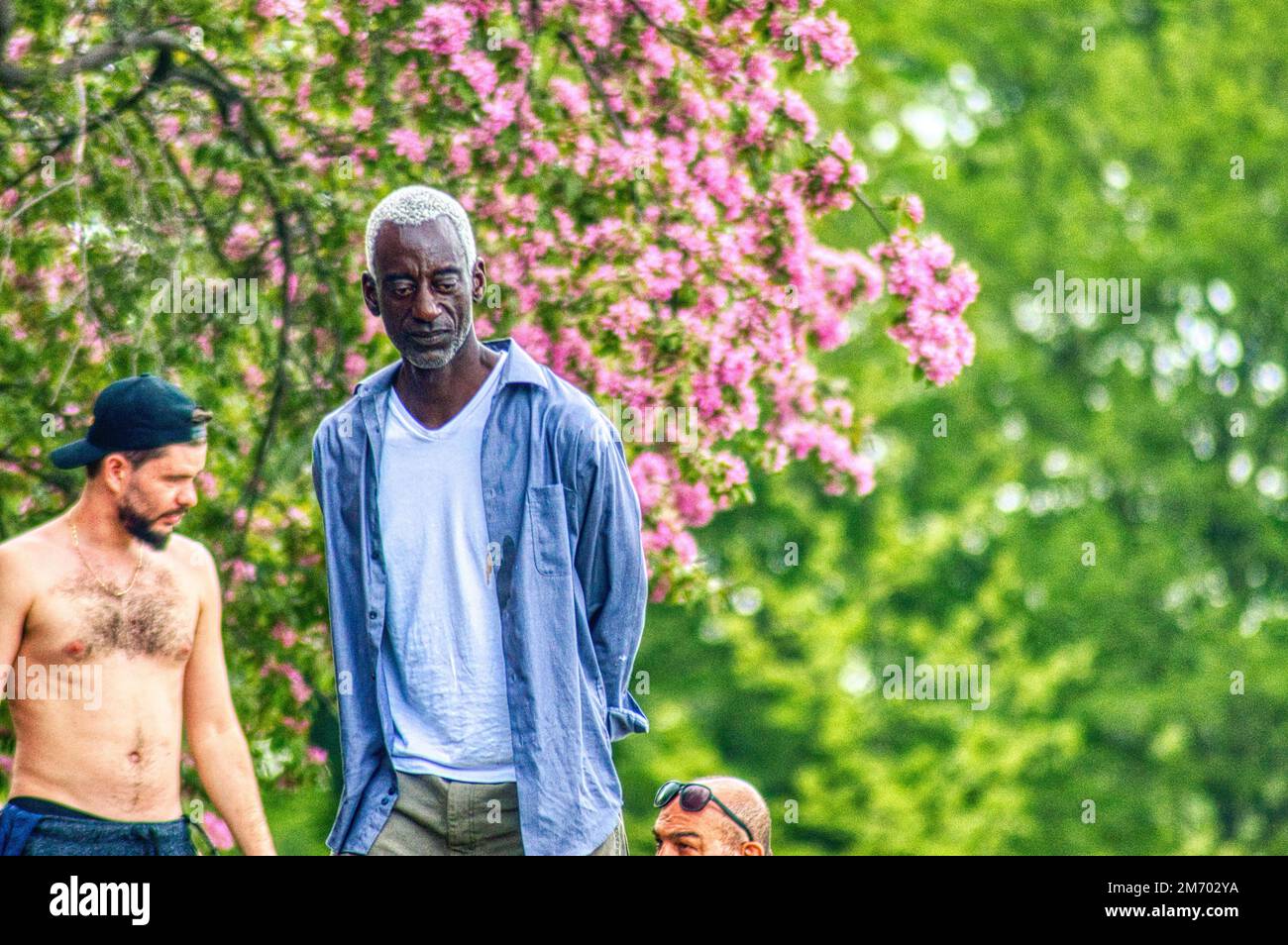 People enjoying early summer weather at a drum circle at Monument a sir ...