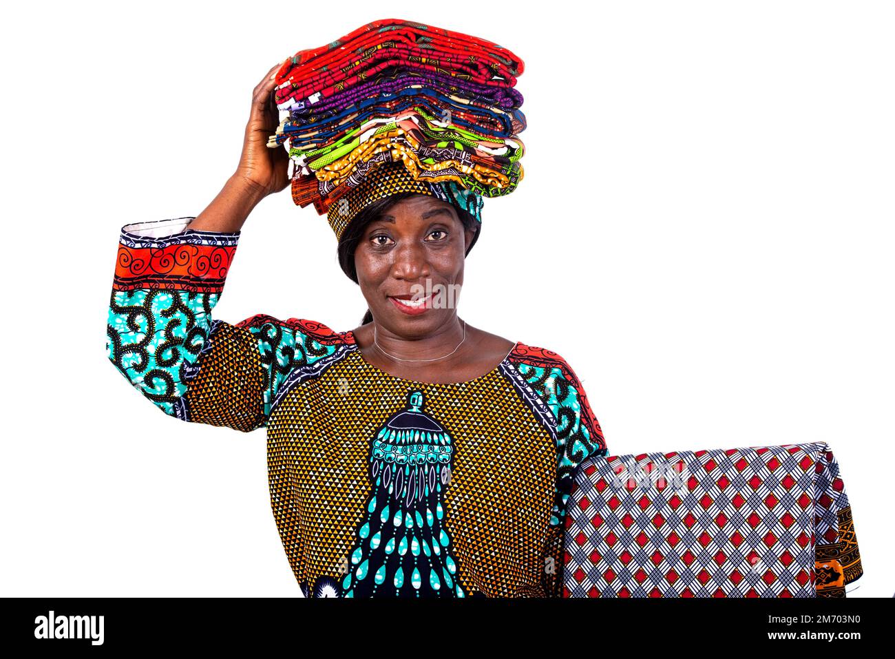 portrait of a beautiful woman holding traditional loincloths on her ...