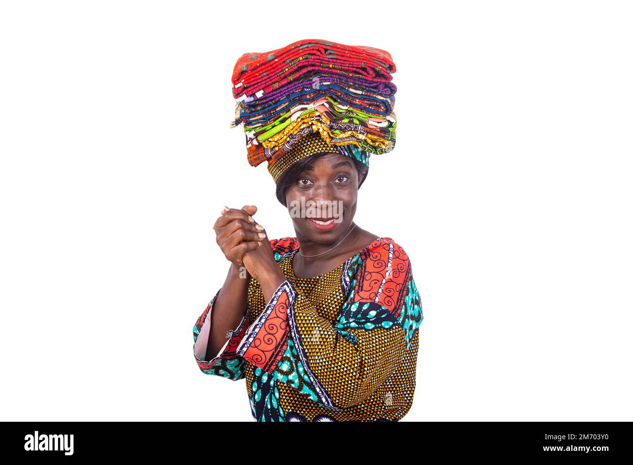 portrait of a beautiful woman holding traditional loincloths on her ...