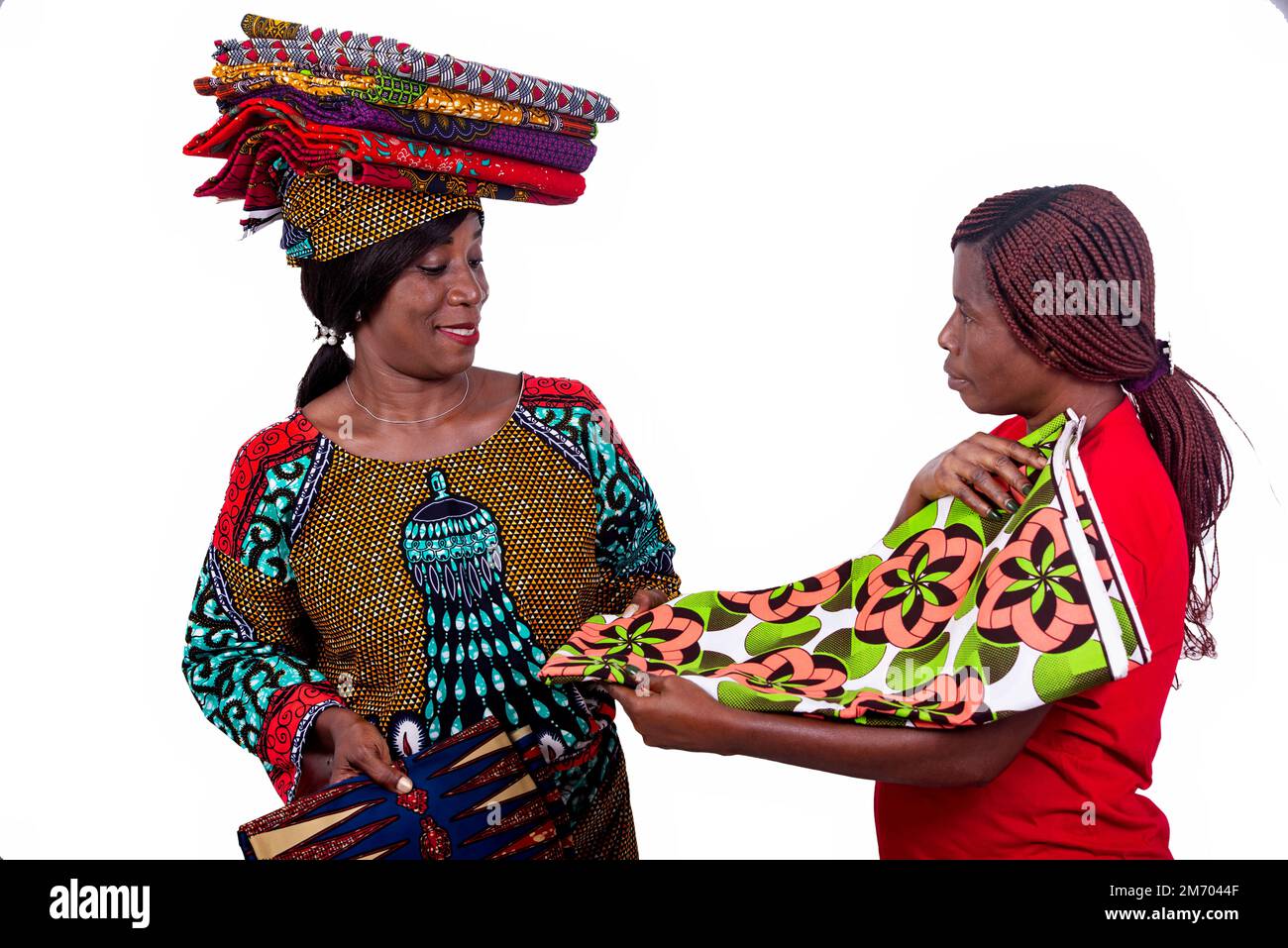 portrait of a beautiful woman showing different traditional loincloths ...