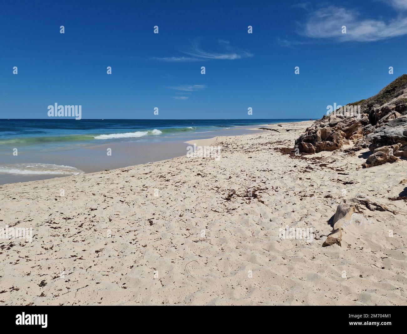 Beach West Australia with a view over the Indian Ocean under a blue sky ...
