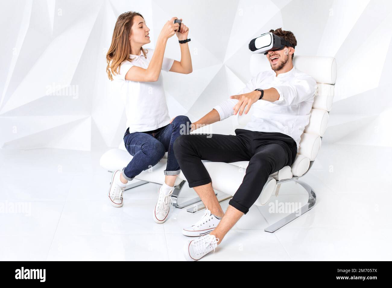 Couple having fun playing with virtual reality Stock Photo - Alamy