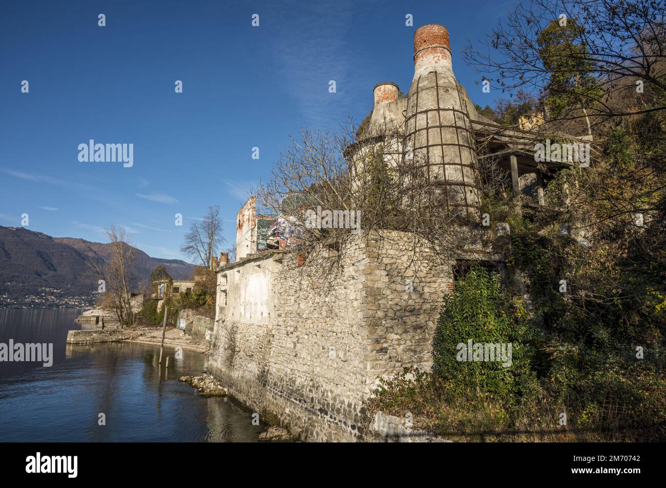 Castelveccana, Italy- 12-27-2022: Red brick chimneys and abandoned ...