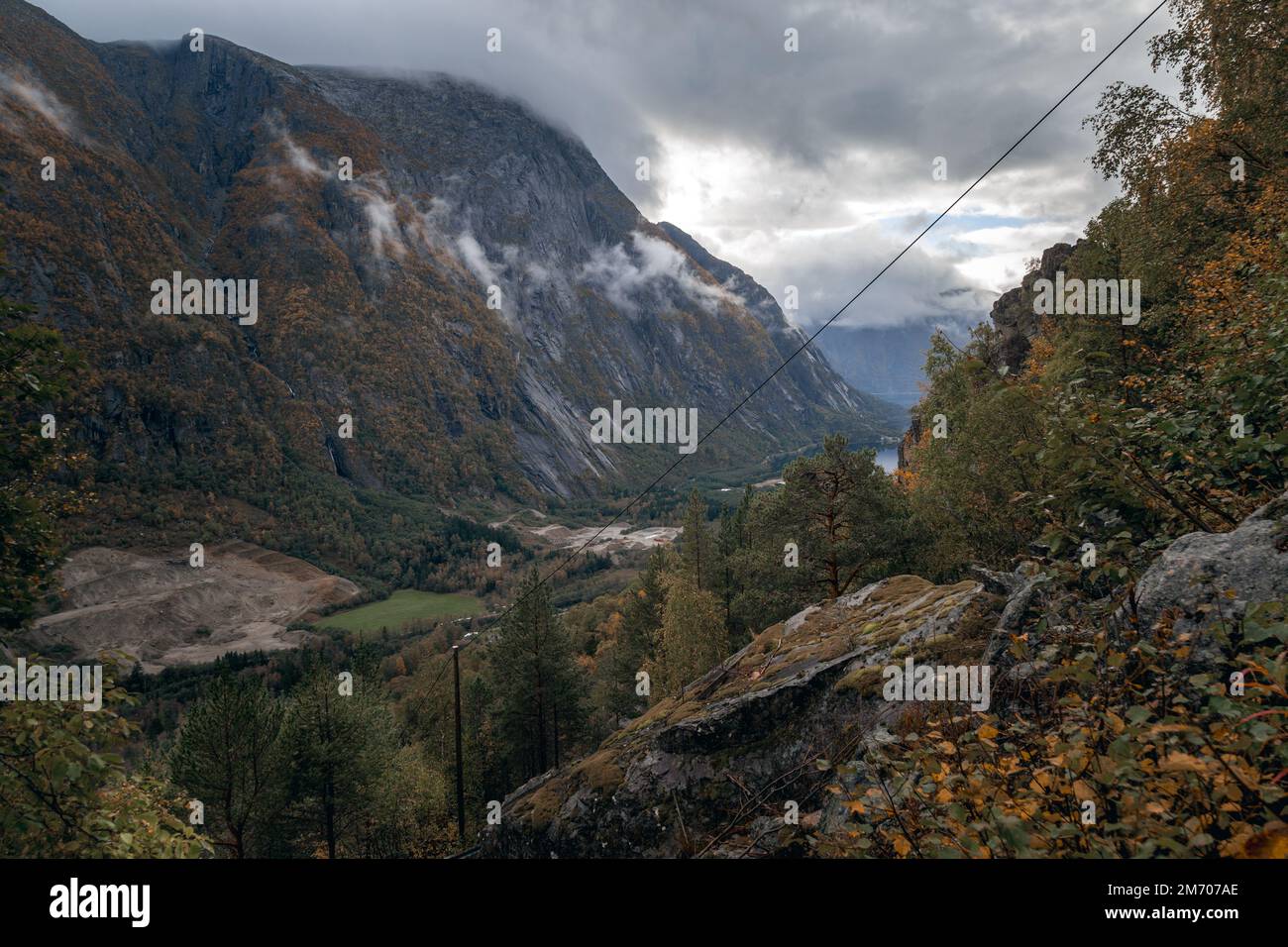 A deep valley with the fjord in the background Stock Photo - Alamy