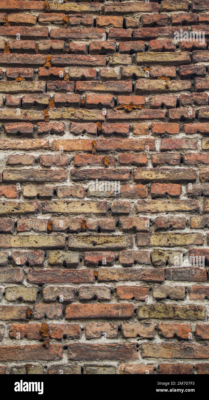 old brick wall of a european house in the city. old facade Stock Photo ...
