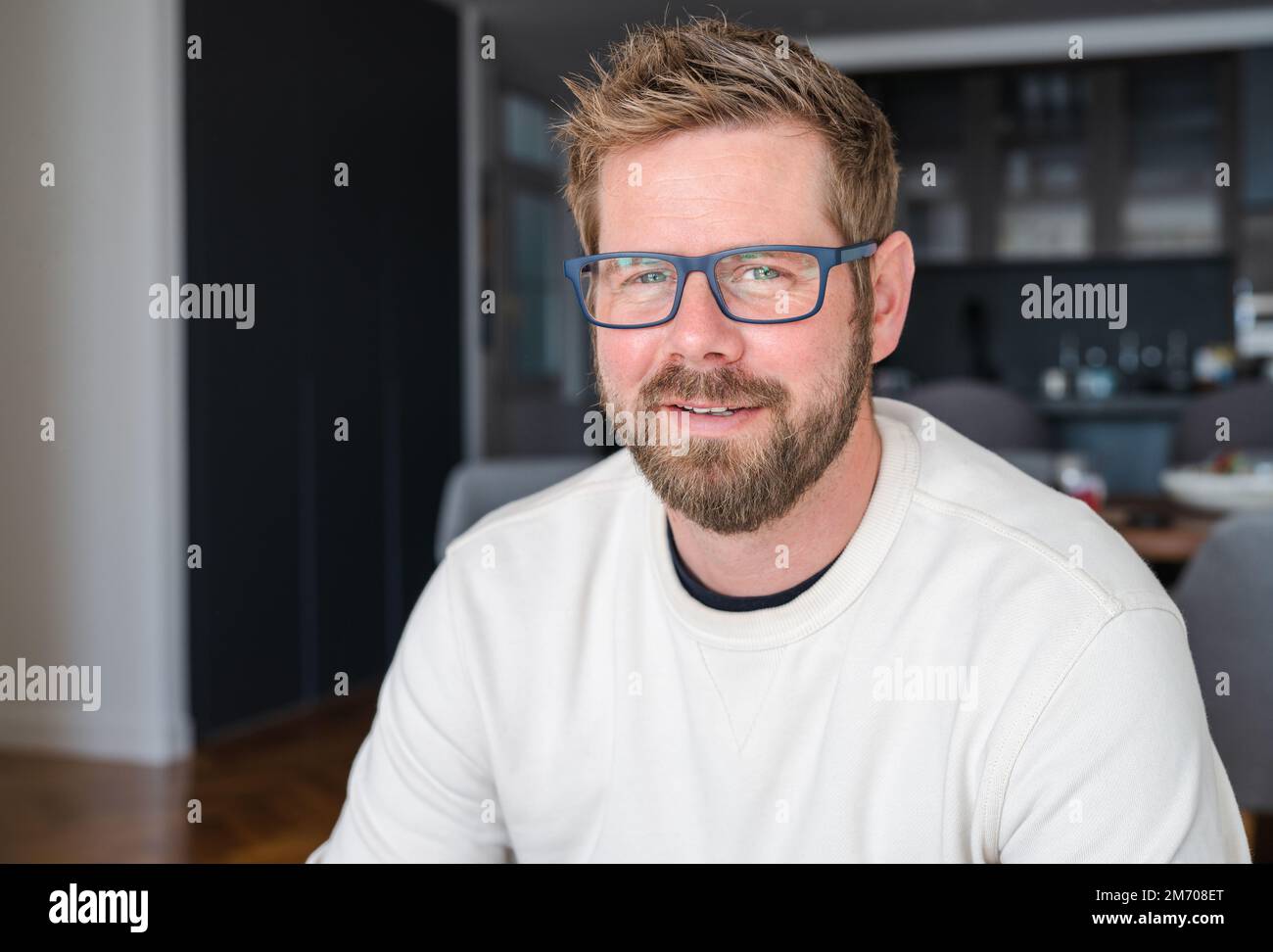Close up portrait of smiling 30s Caucasian man look at camera posing in ...