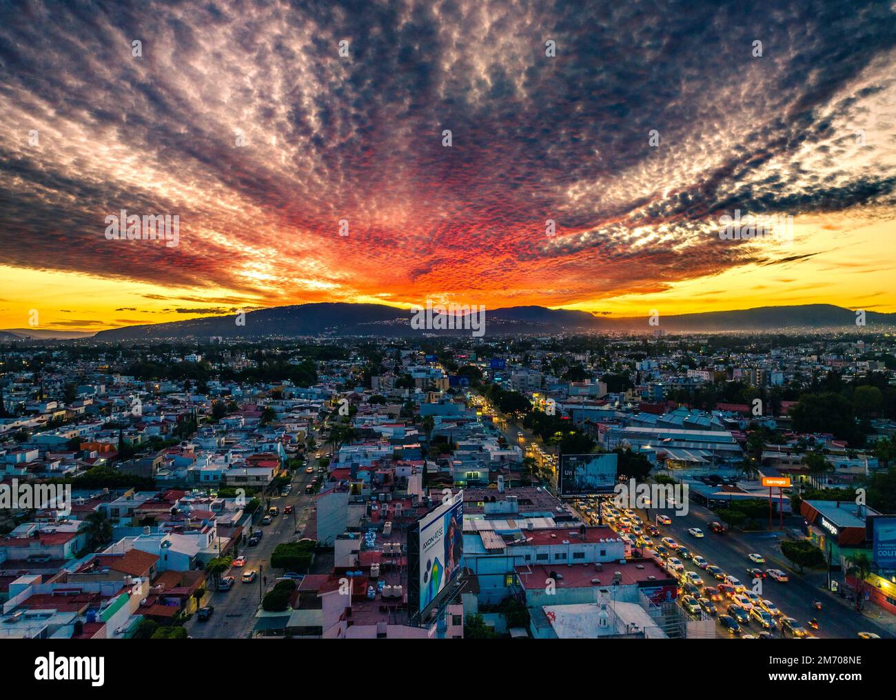 Long exposure aeriel shots of sunset and a busy crossroad in Zapopan ...