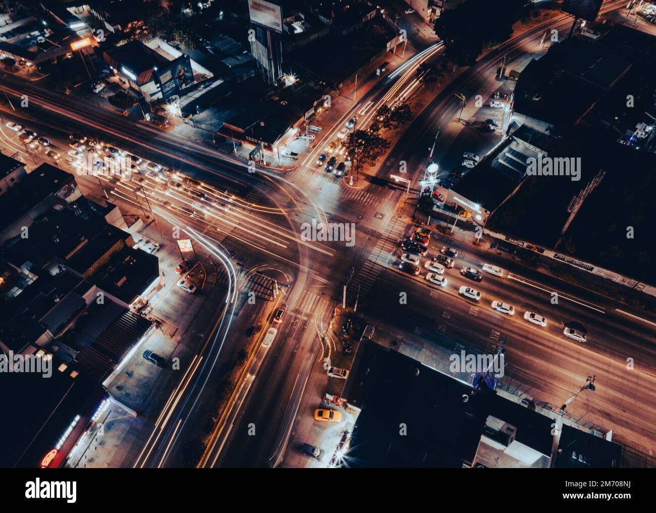 Long exposure aeriel shots of sunset and a busy crossroad in Zapopan ...
