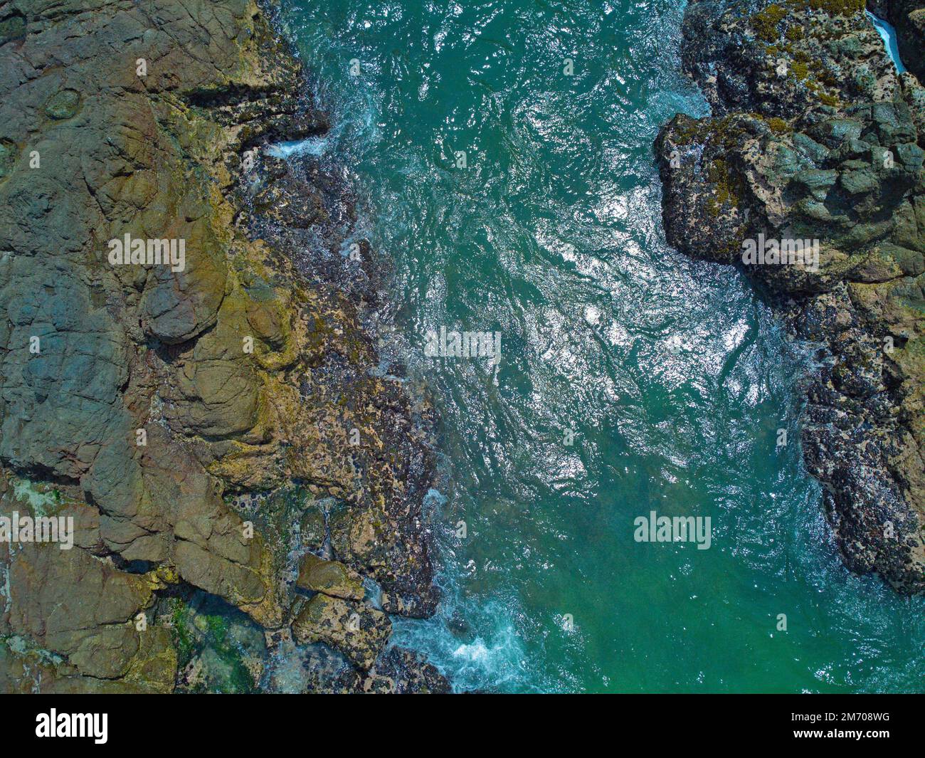 Colorful Rock and their shape formation by crashing waves over the ...